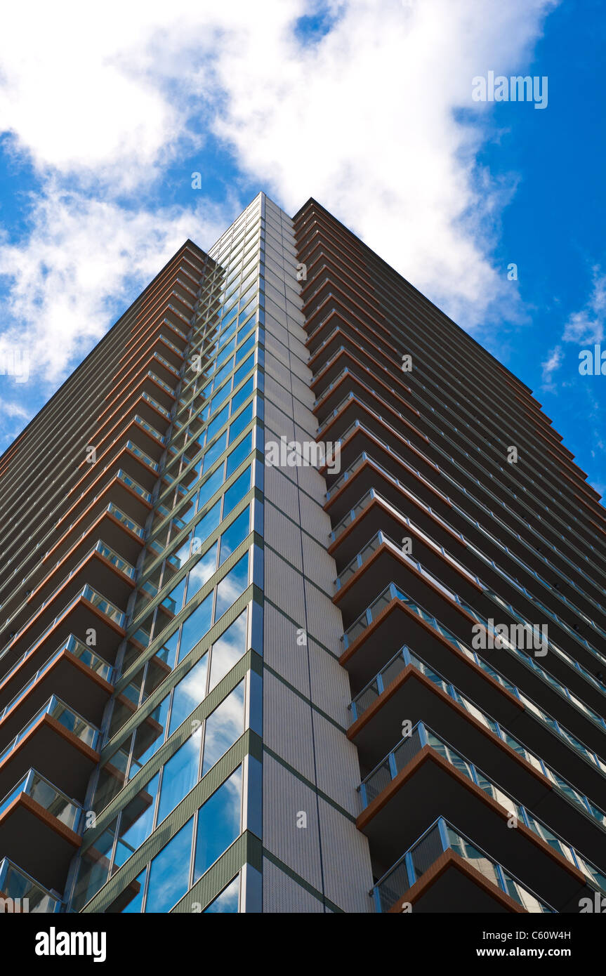 Office building front view with blue sky Stock Photo - Alamy