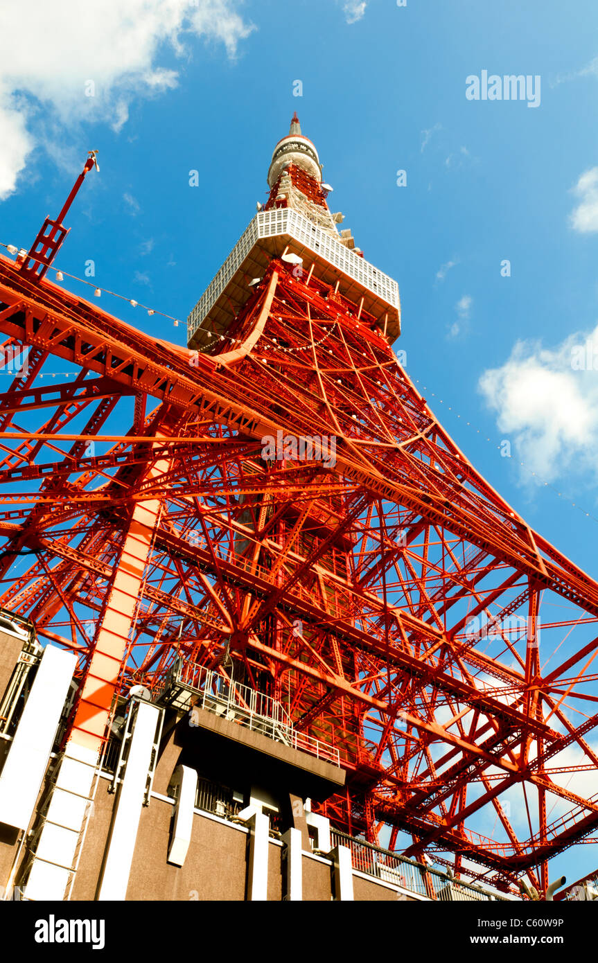 Tokyo tower face cloudy sky on a bright day Stock Photo - Alamy