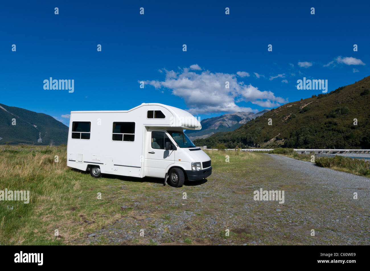 Campervan on a rest area on a sunny day Stock Photo - Alamy