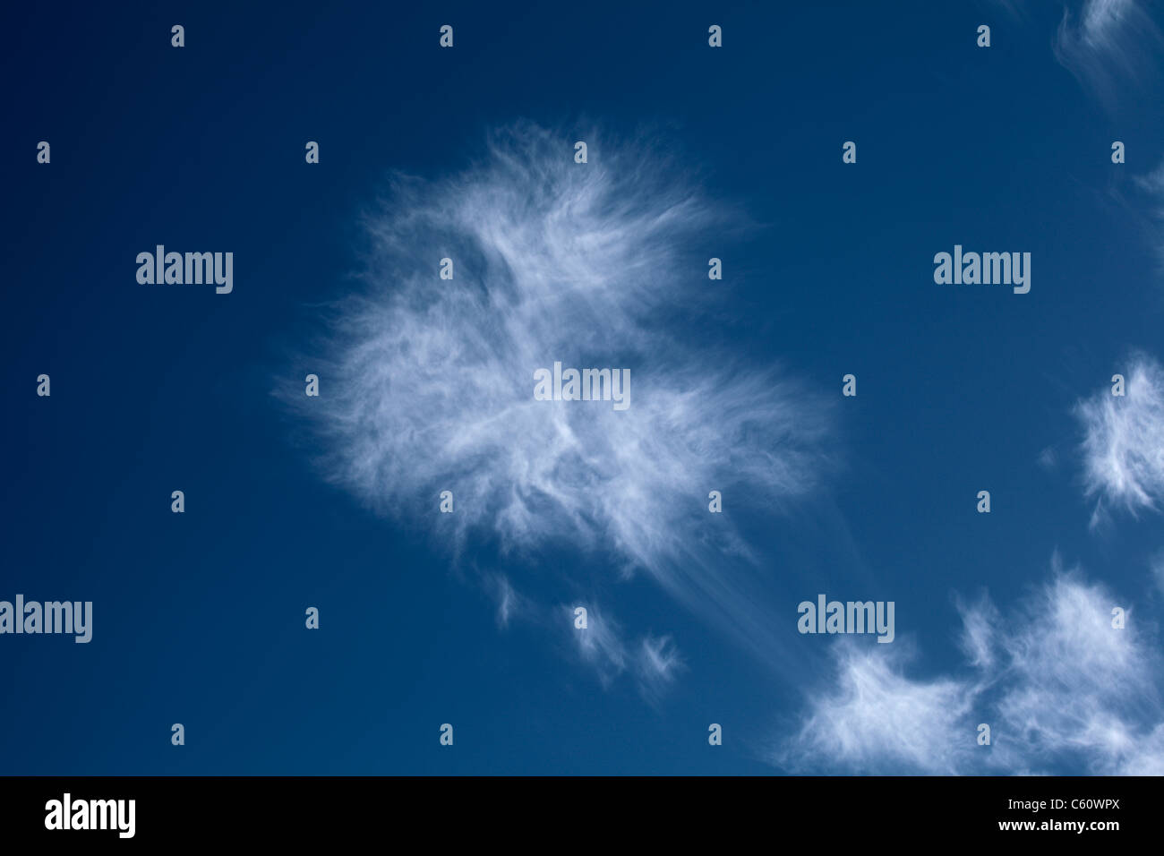 Patchy cirrus cloud which looks like a cottonball Stock Photo - Alamy