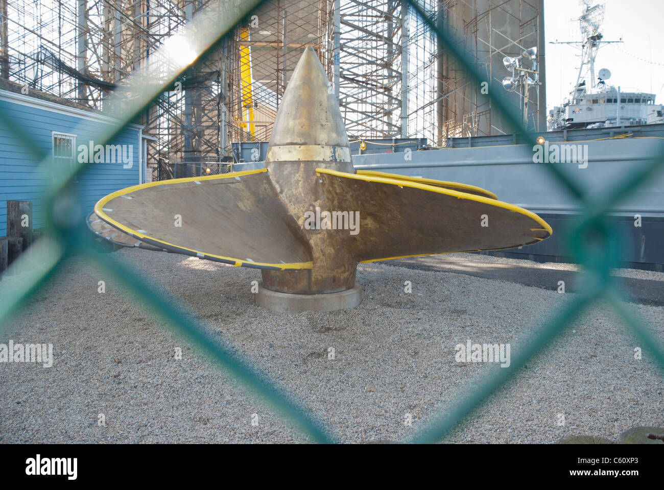 An old propeller is on display at Battleship Cove, beneath the Braga ...