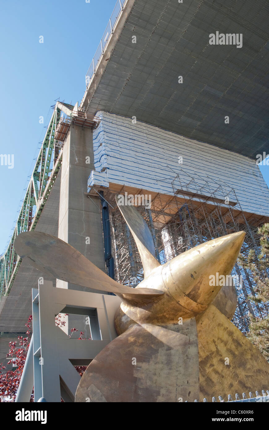 An old propeller is on display at Battleship Cove, beneath the Braga ...