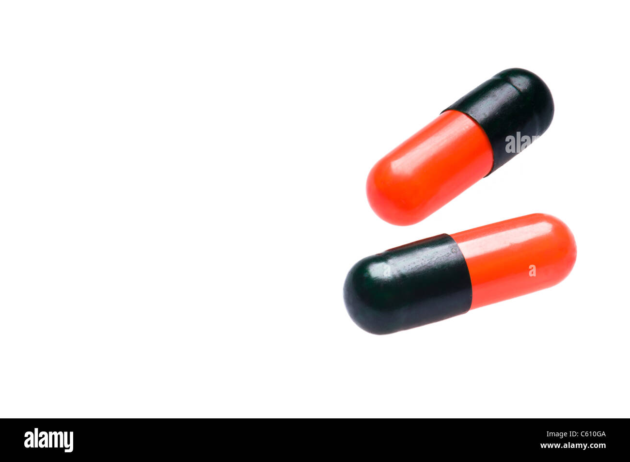 Two red capsules medical hi-res stock photography and images - Alamy