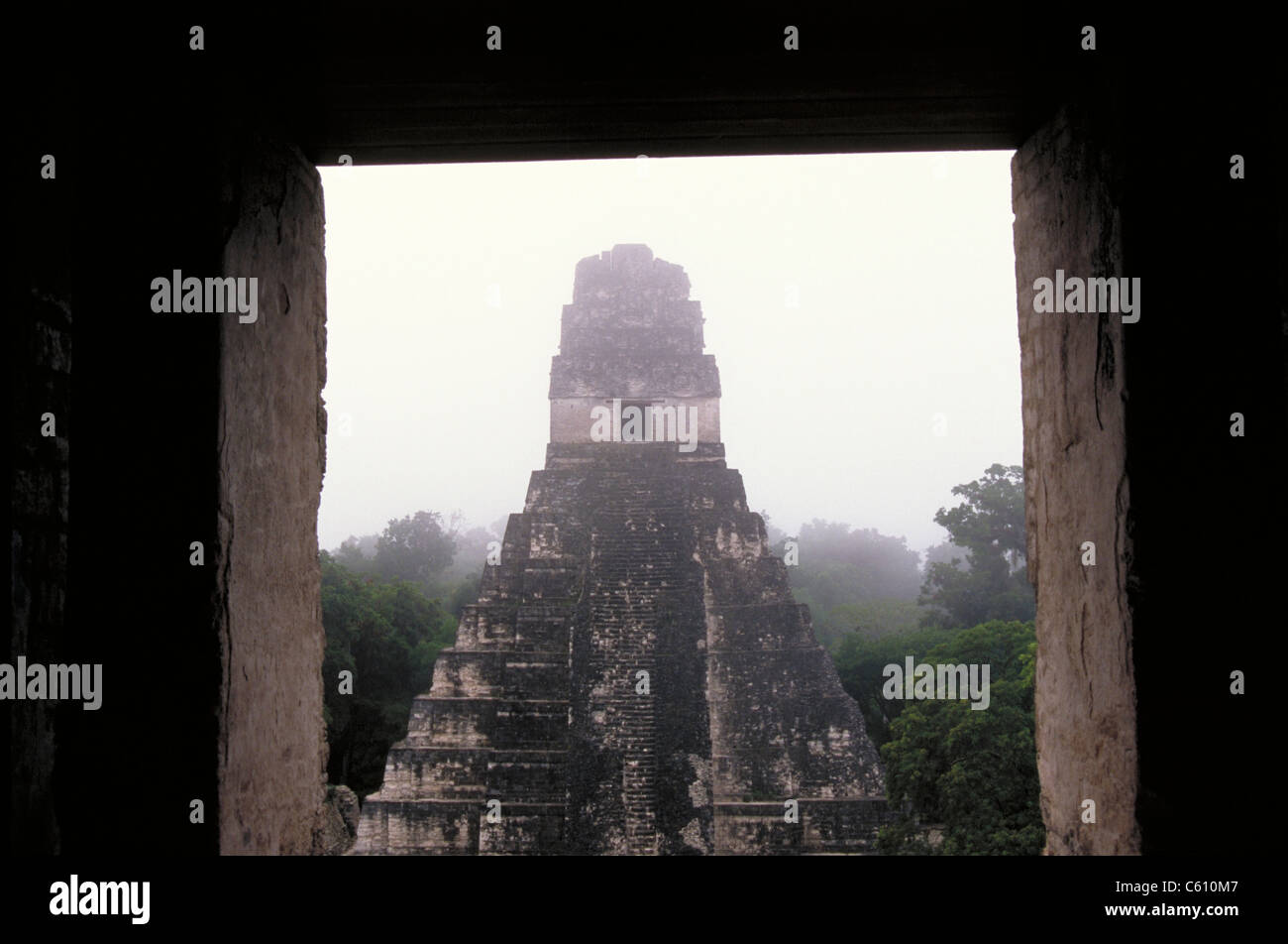 travel image tikal mayan ruin framed by doorway Stock Photo - Alamy