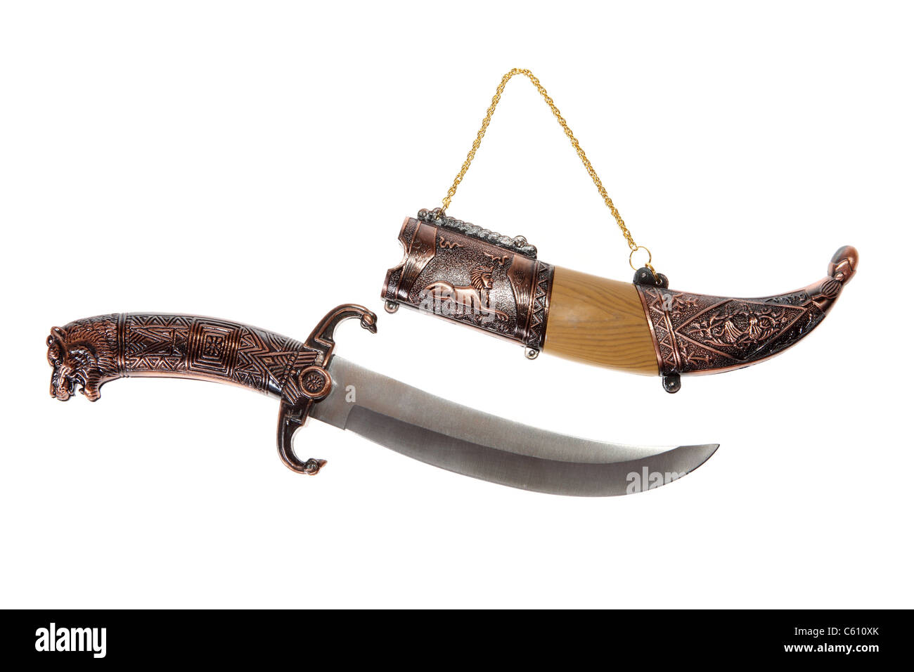 Model of the old dagger with a white background, souvenir Stock Photo ...