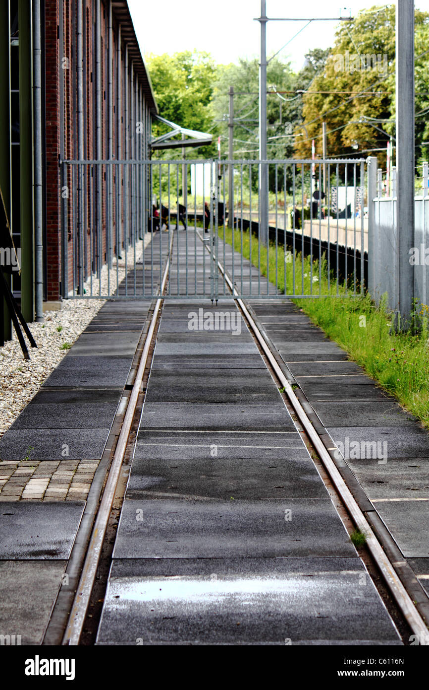 a railway closed by a gate Stock Photo - Alamy