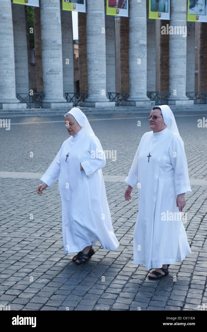 Italy, Rome, The Vatican, Nuns Walking at St. Peter's Basilica Stock ...