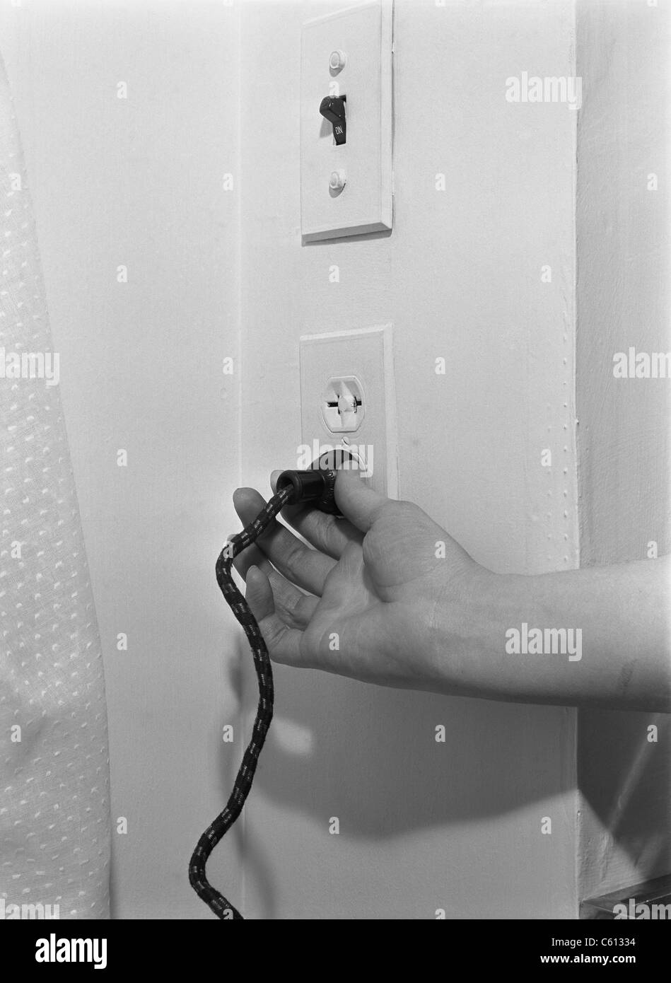 Electrical outlets in an American home during World War II. The photo ...