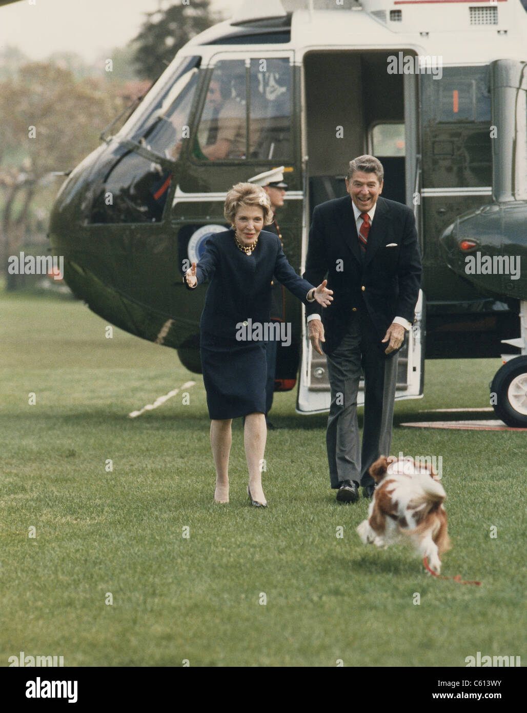 The Reagan's being greeted by their dog 'Rex' after returning from Camp ...