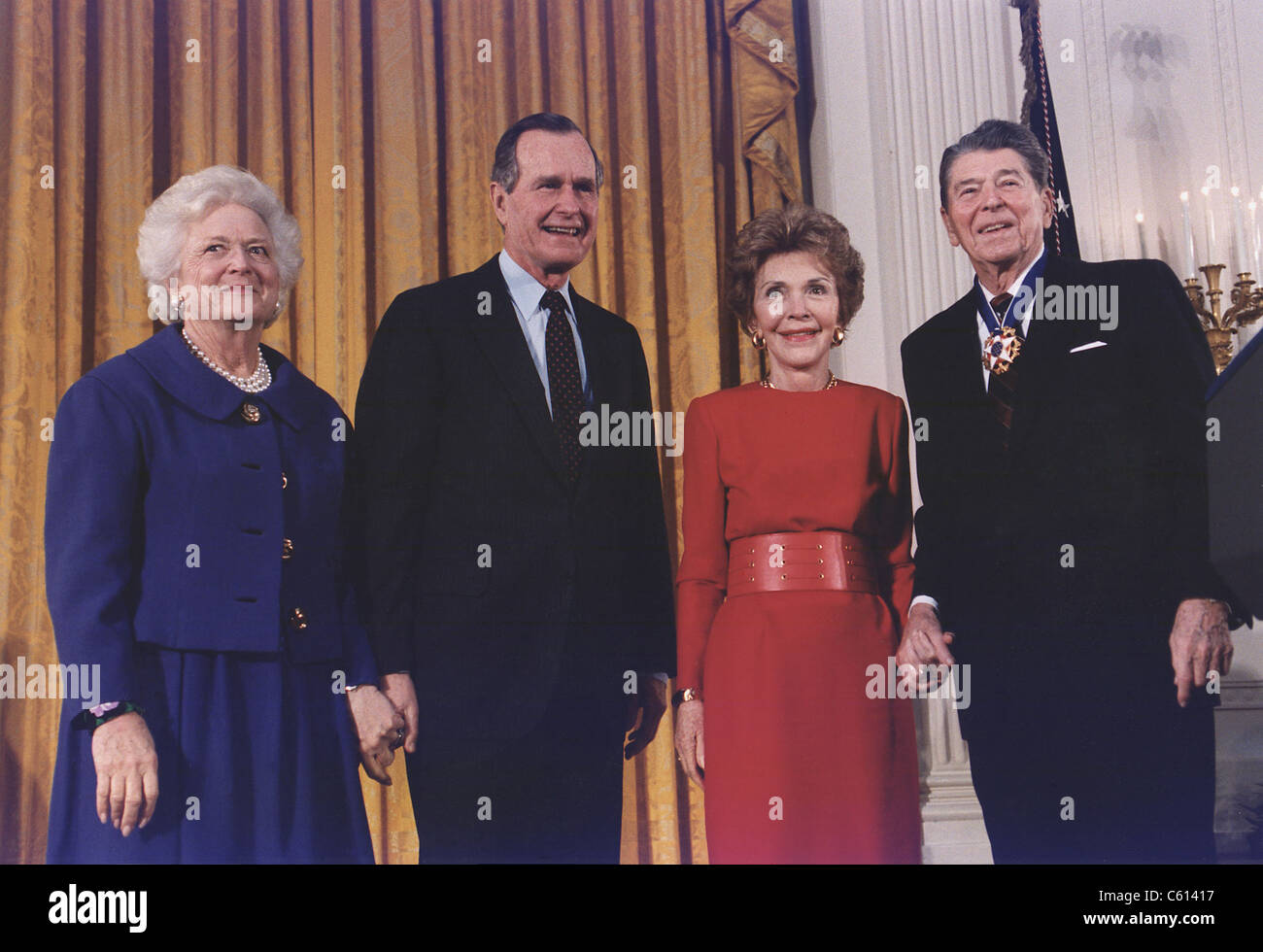 President George Bush presents the Medal of Freedom award to former ...