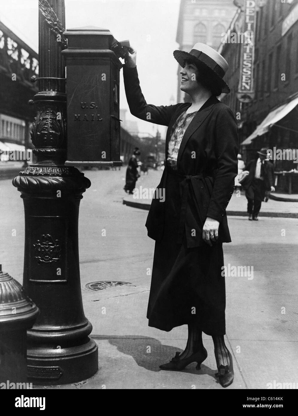 Merle Alcock opera contralto mailing a letter in mailbox attached to a ...
