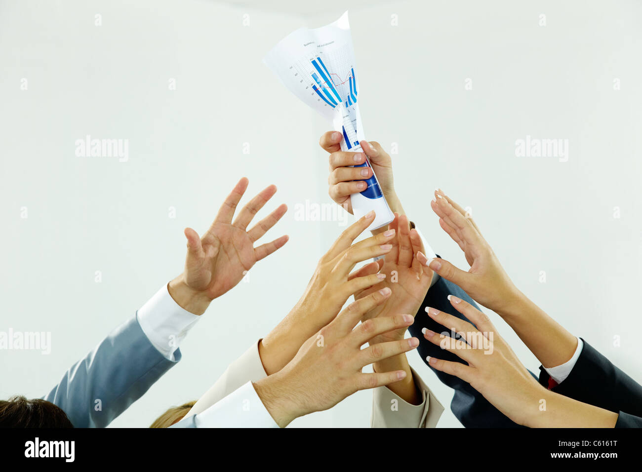 Several raising human hands hi-res stock photography and images - Alamy