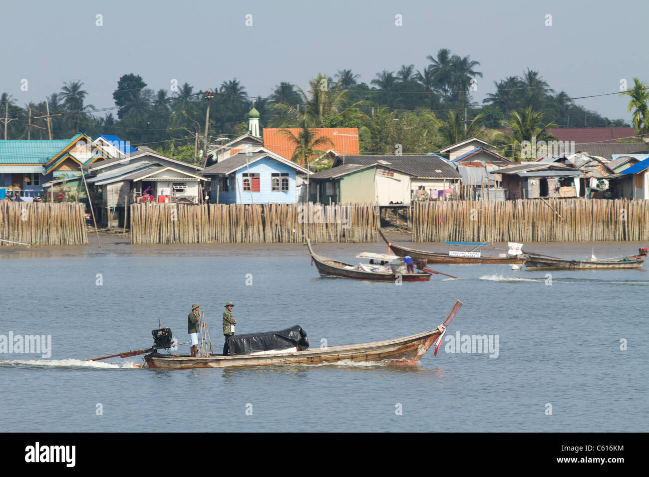 traditional fisher village on krabi river bank, krabi ,thailand Stock ...