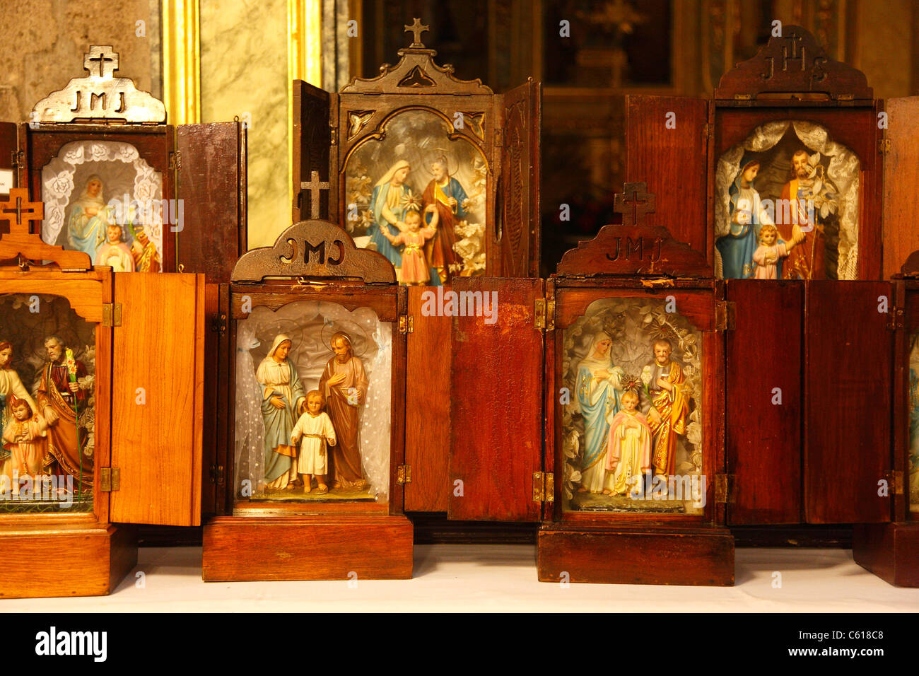Wooden Holy Family shrines on display Stock Photo - Alamy