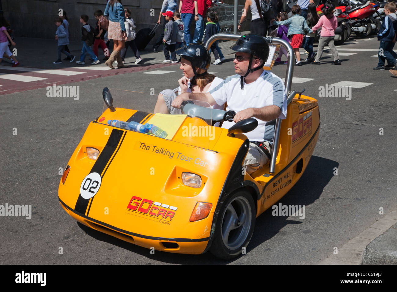 Spain, Barcelona, Tourists in Go Car Open Topped Vehicle Stock Photo ...