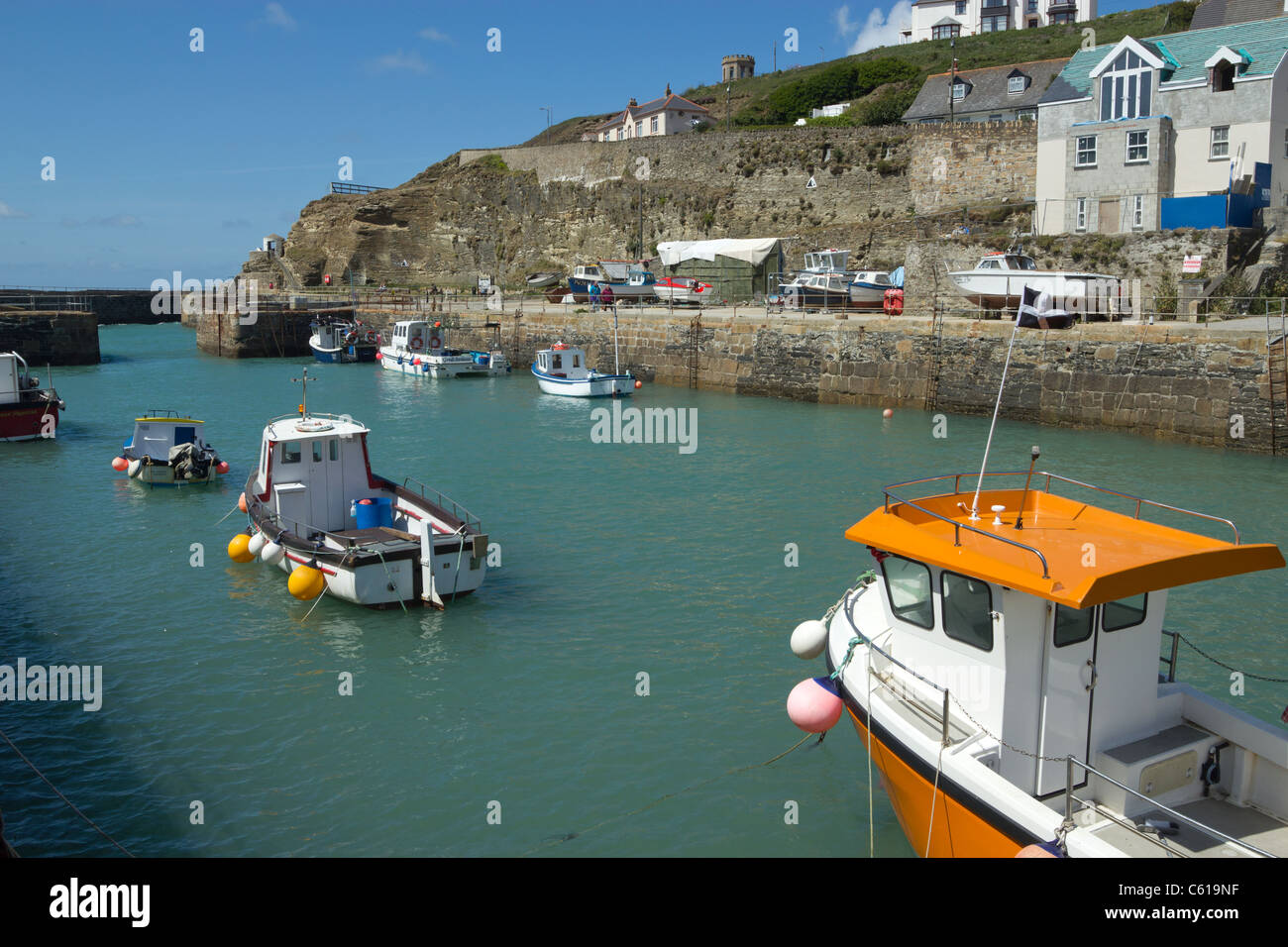 Fishing boats in Portreath harbour near high tide, Cornwall UK Stock ...