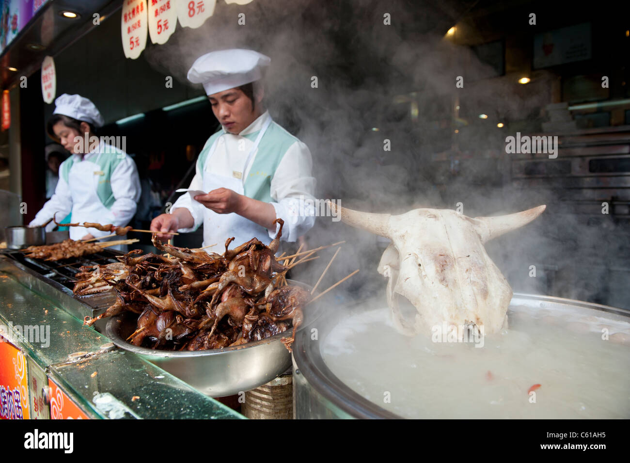 Street Food Stall serving Chinese Delicacies such as Barbecued Small ...