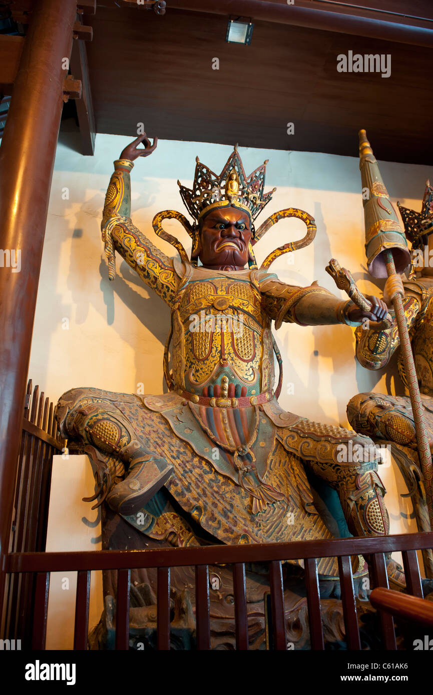 Guardian Next to the Altar in the Jade Buddha Temple, Shanghai, China ...