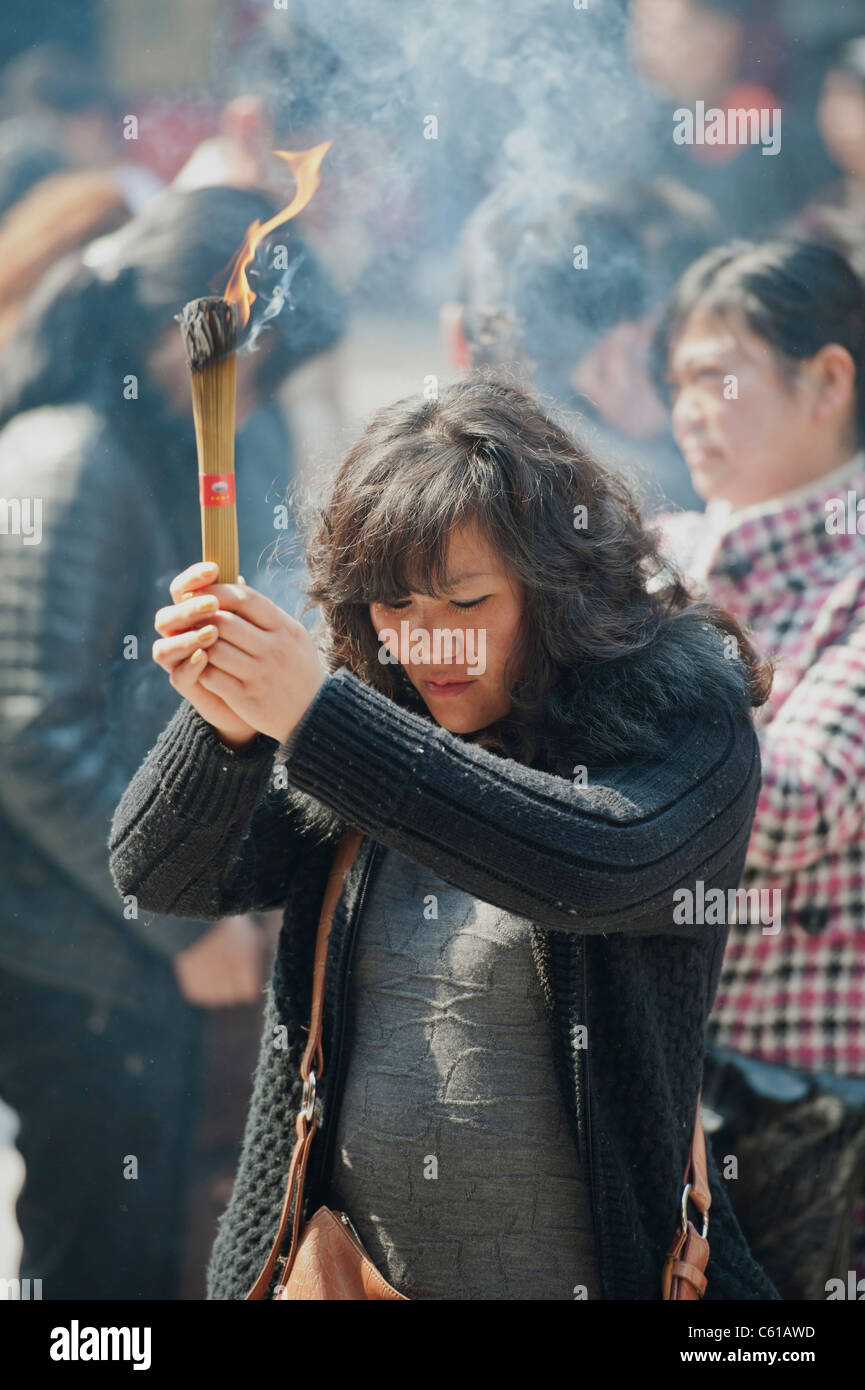 Buddhist Follower Praying in the Jade Buddha Temple, Shanghai, China ...