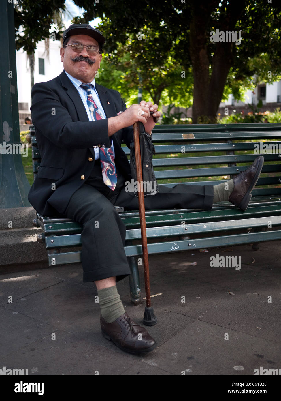 Man with Polio sits on a park bench Stock Photo - Alamy
