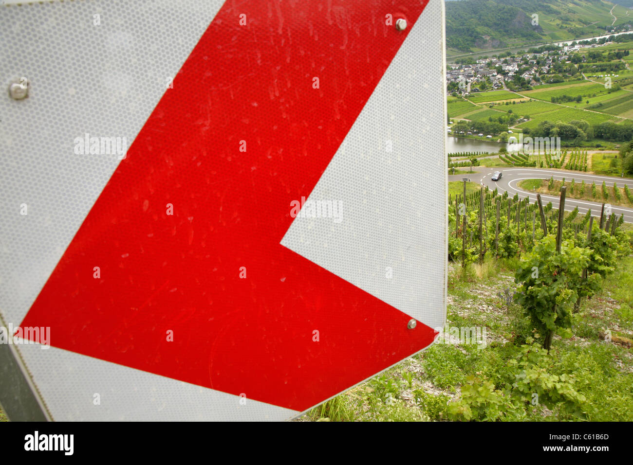 Warning sign on switchback road through vineyards alongside the river ...