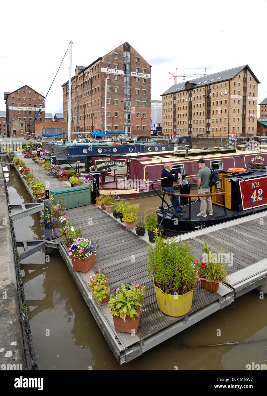 Canal narrow boats and yachts and other river craft moored up at the ...