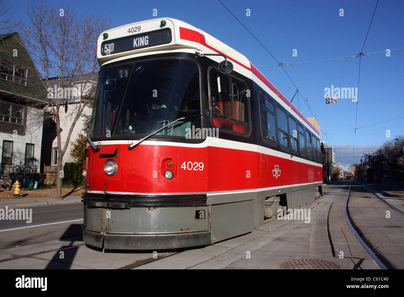 Tram of Toronto Transit Commission TTC runs towards King Street Central ...