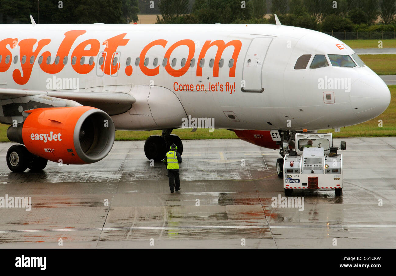 Ground support service using a pushback tractor to move an Easyjet ...