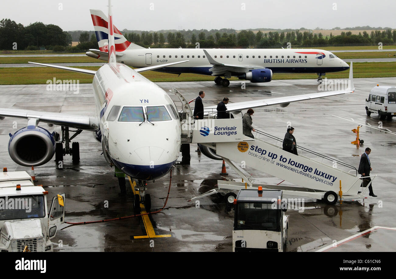BA Cityflyer Embraer aircraft on the apron at Edinburgh Airport ...
