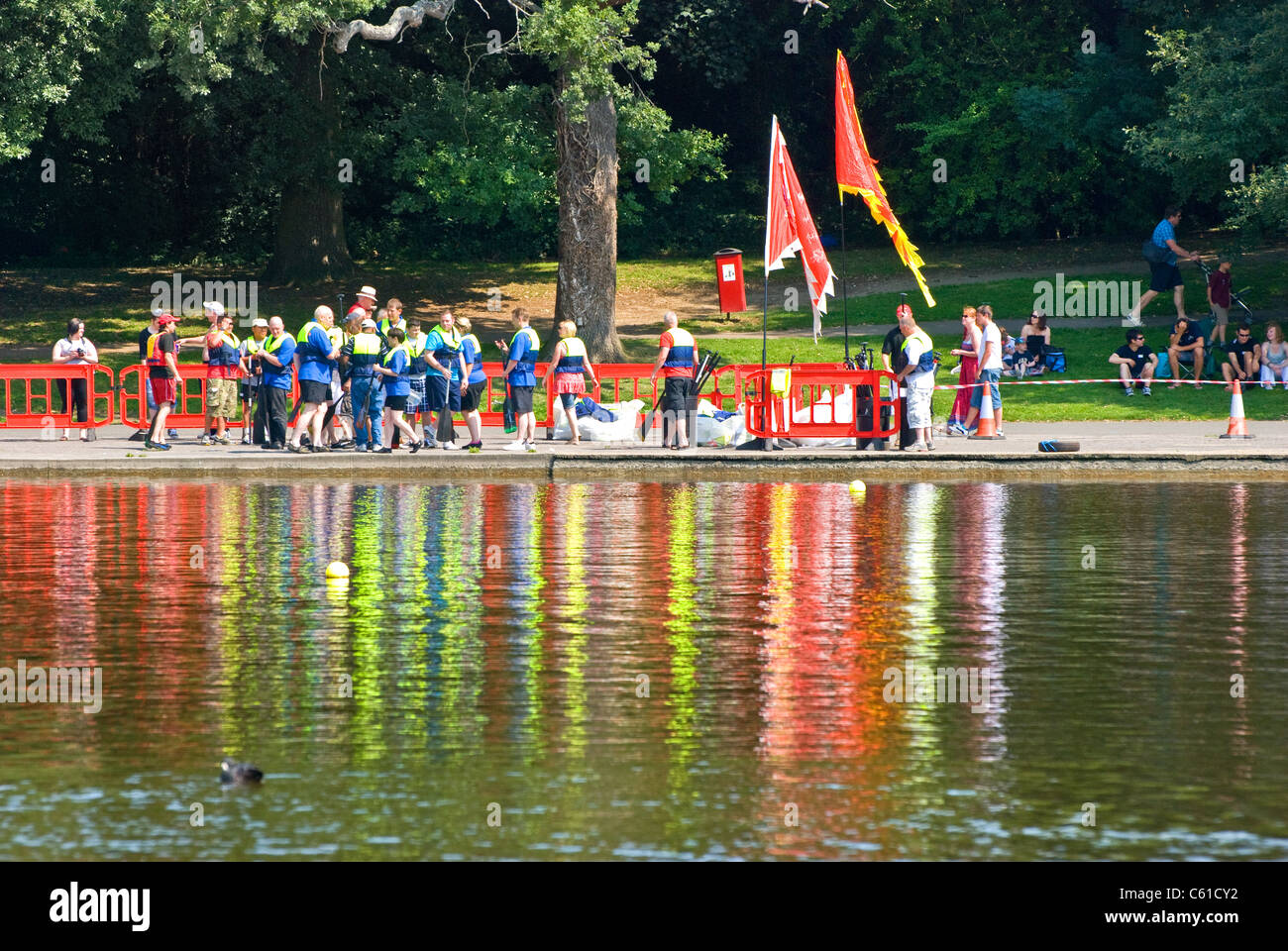 Spectators at a dragon boat race Stock Photo - Alamy