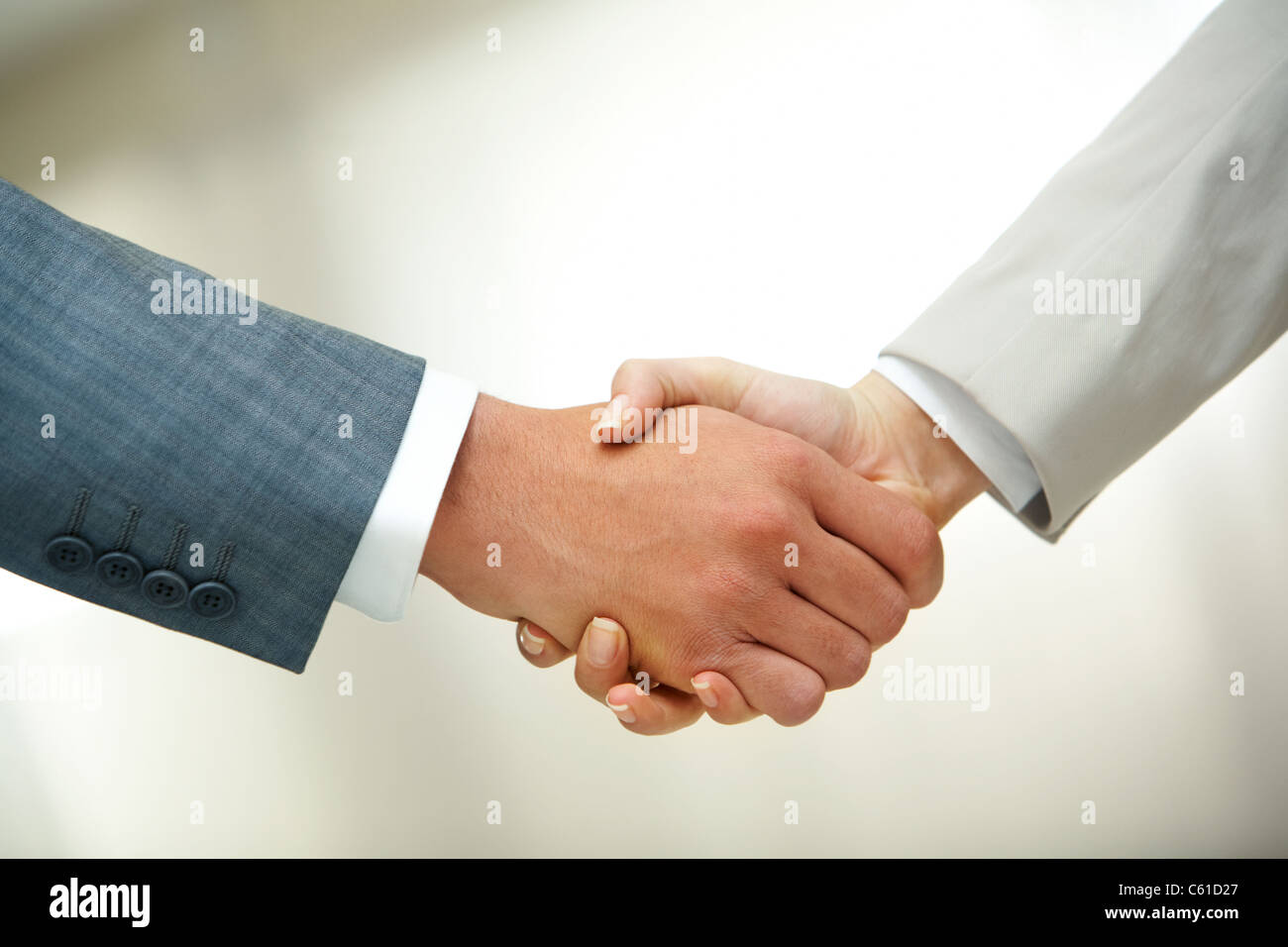 Photo of handshake of business partners after signing contract Stock ...