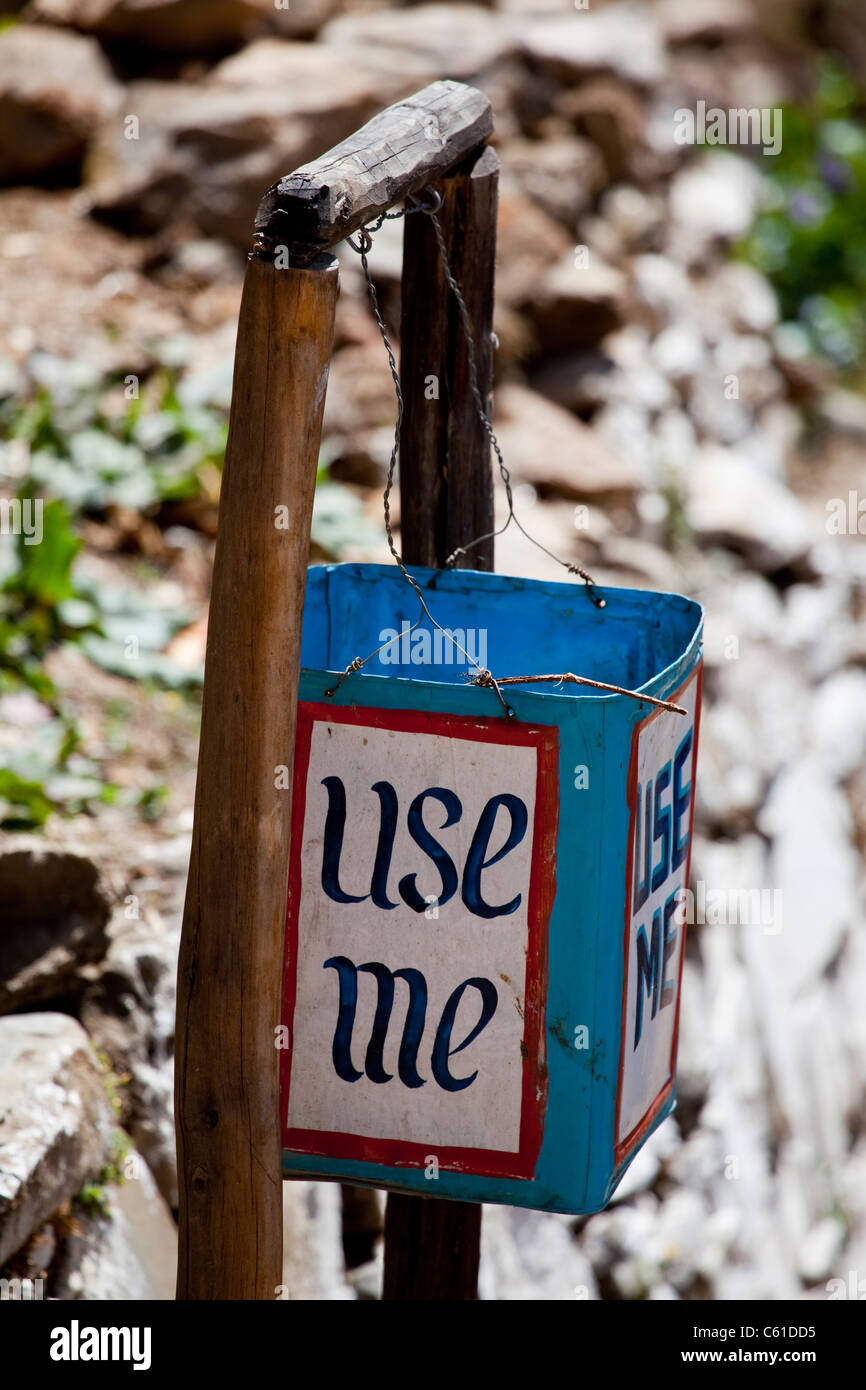Encouraging litter bin seen on a trail in Bhutan Stock Photo - Alamy