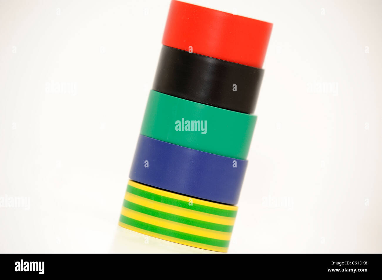 electrical tape stacked on a white background uk Stock Photo - Alamy