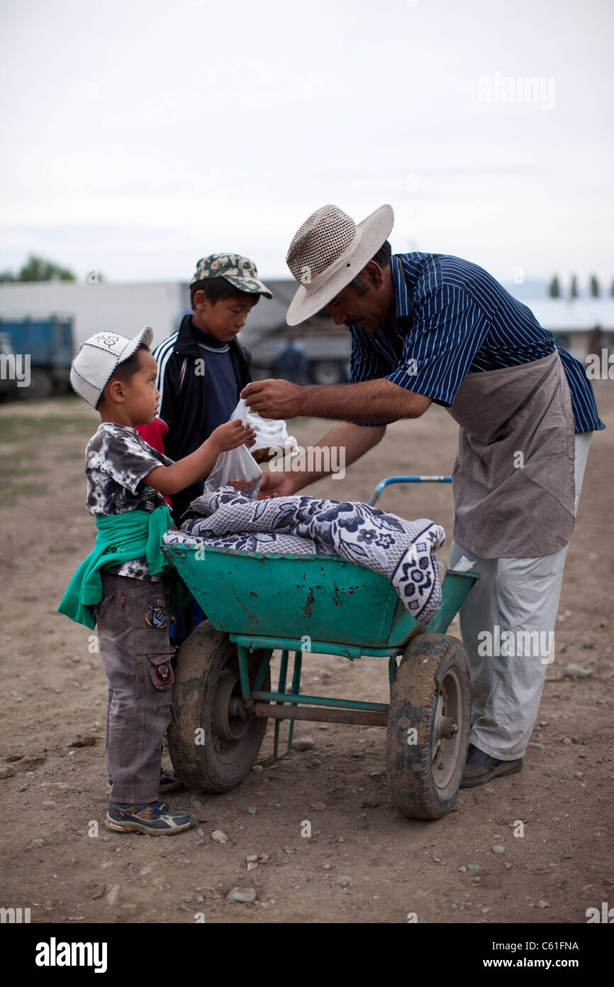 The Sunday animal market (Mal Bazaar) in Karakol, Kyrgyzstan Stock ...