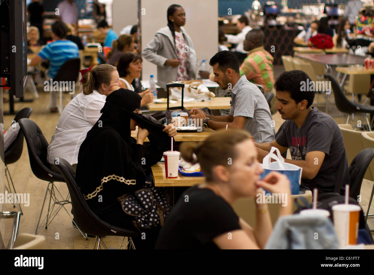 A muslim woman what burca eating Stock Photo - Alamy