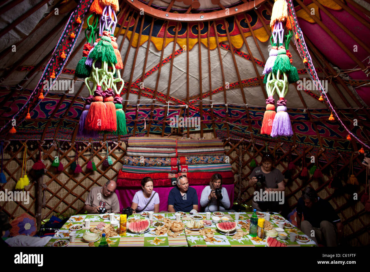 Eating in a yurt in Kyrgyzstan Stock Photo - Alamy