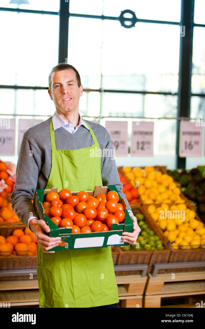 Friendly fruit merchant hi-res stock photography and images - Alamy