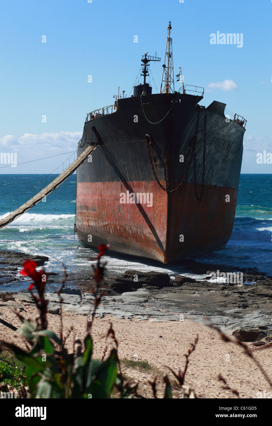 The 164 metre bulk tanker, Phoenix, aground on a rocky shelf at ...