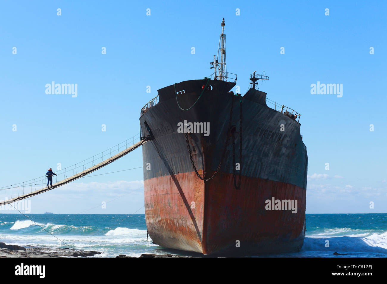 Salvage operators prepare the Phoenix for towing off the rocks ...