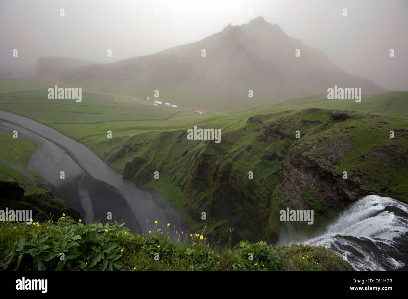 Skogafoss waterfall from top, lots of dust particles in the air from ...