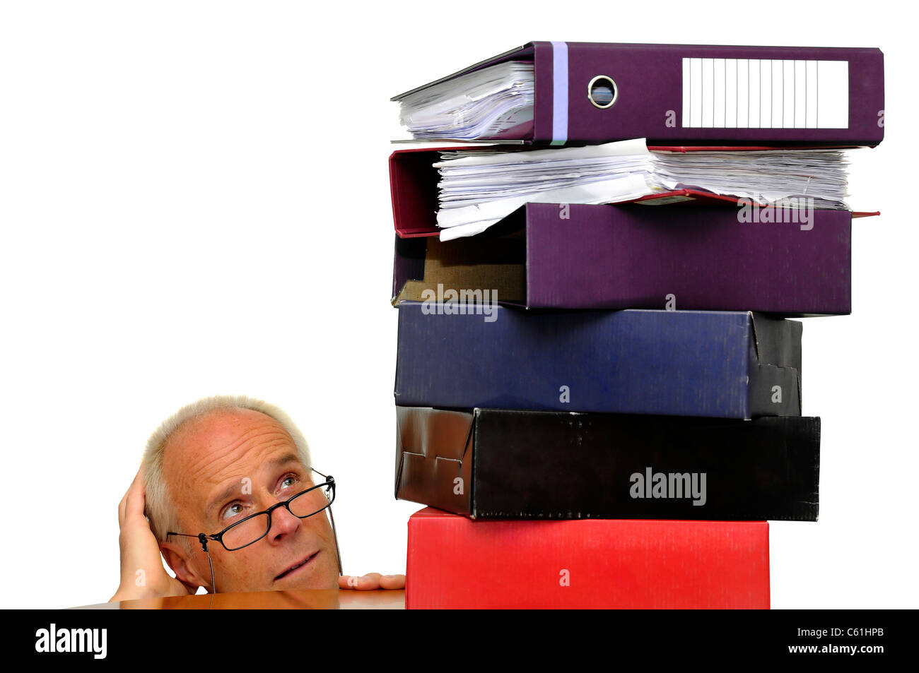 Worker with stack of files isolated in white Stock Photo - Alamy