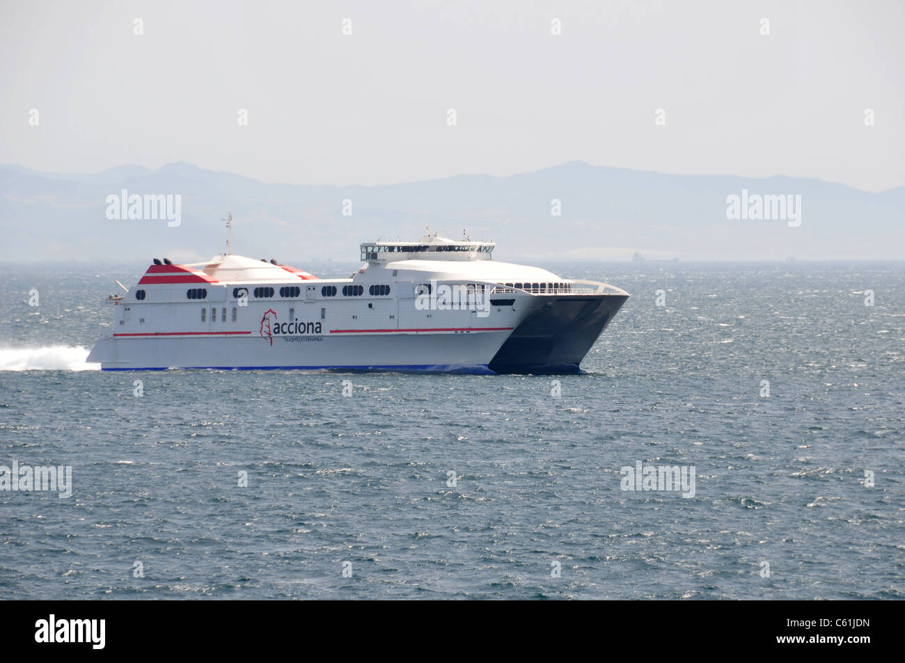 High speed catamaran crossing the Straights of Gibraltar as viewed from ...
