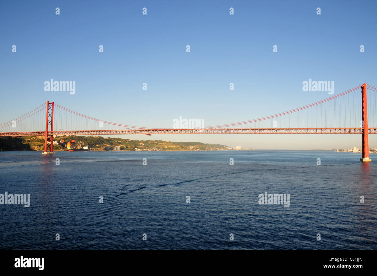 Suspension bridge over the river tagus hi-res stock photography and ...