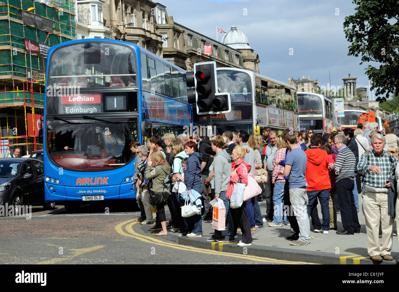 Crowd people waiting buses bus hi-res stock photography and images - Alamy