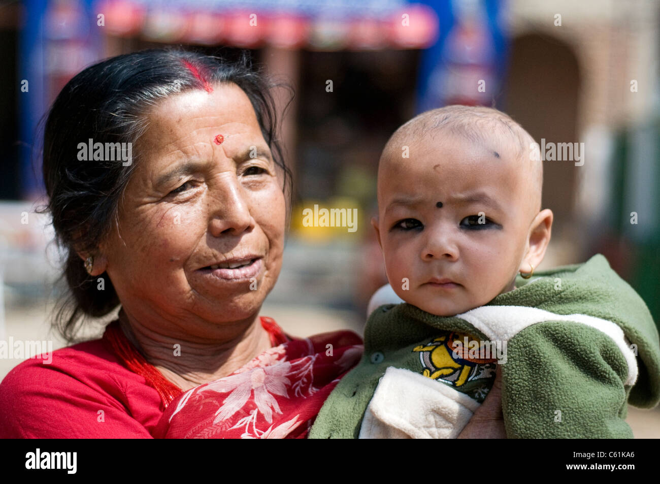 Child wearing makeup as tradition for all Nepali children, Kathmandu ...