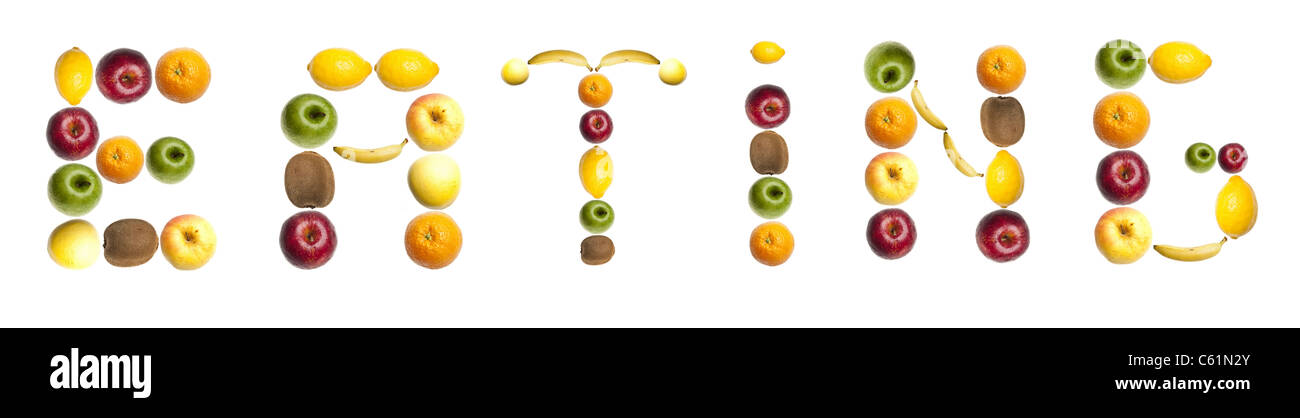 Eating word made of different of fruits Stock Photo - Alamy