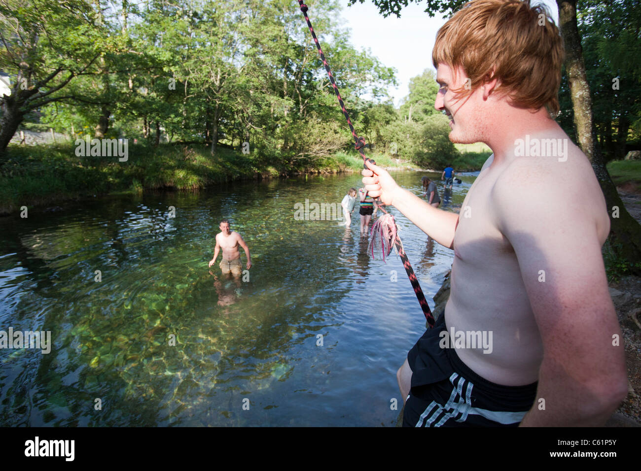 River bank rope swing hi-res stock photography and images - Alamy