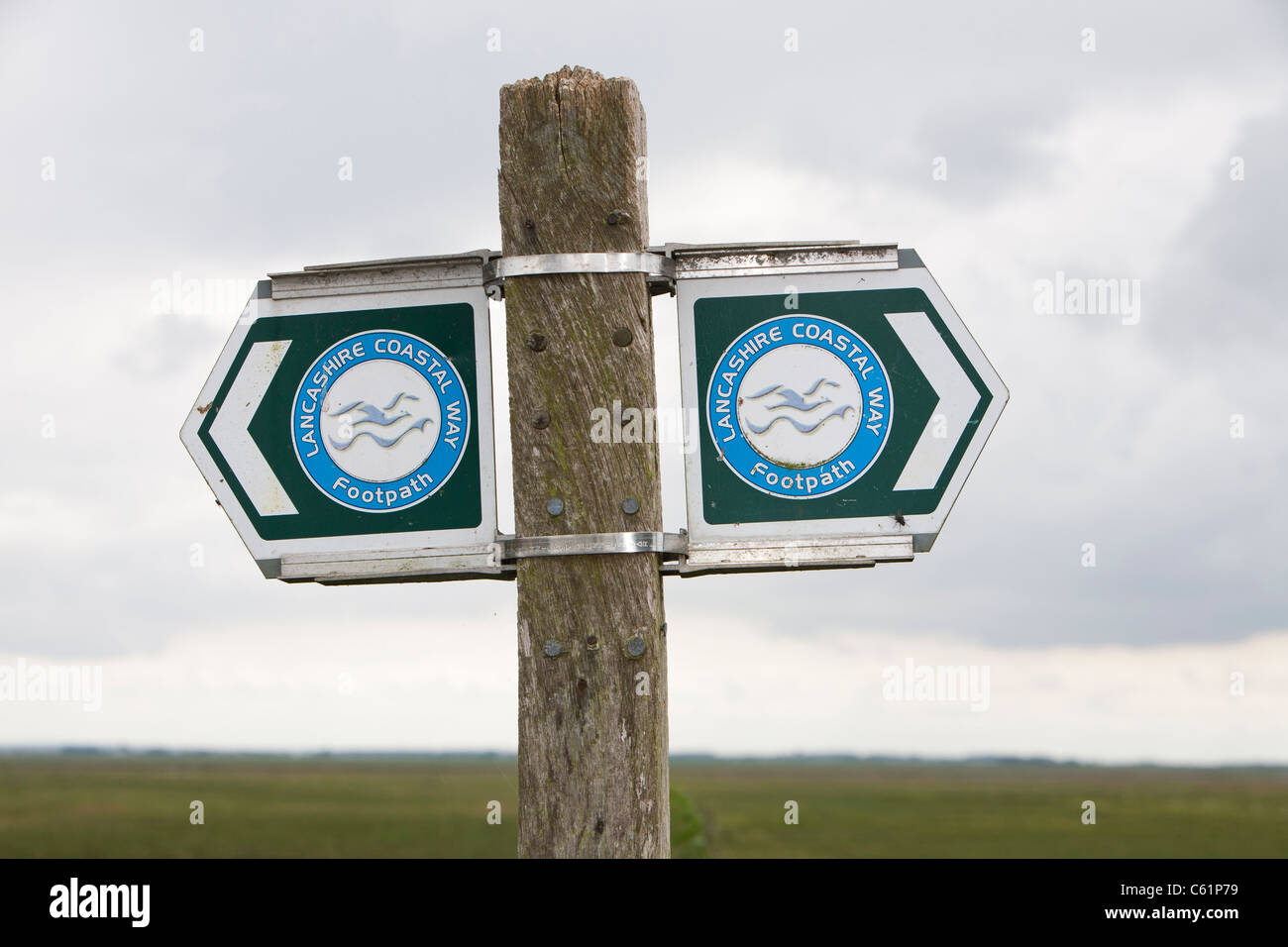 The Lancashire Coastal Way footpath at Warton on the Ribble Estuary, UK ...