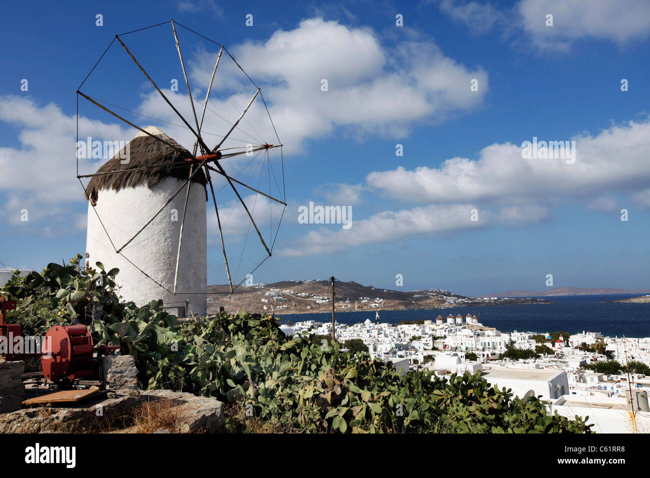 Typical Greek windmills over the old town of Mykonos, Greek Island in ...