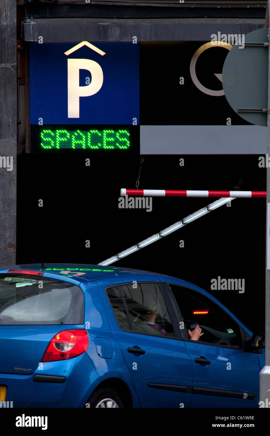 car entering car park under height restriction bar by luminous spaces ...